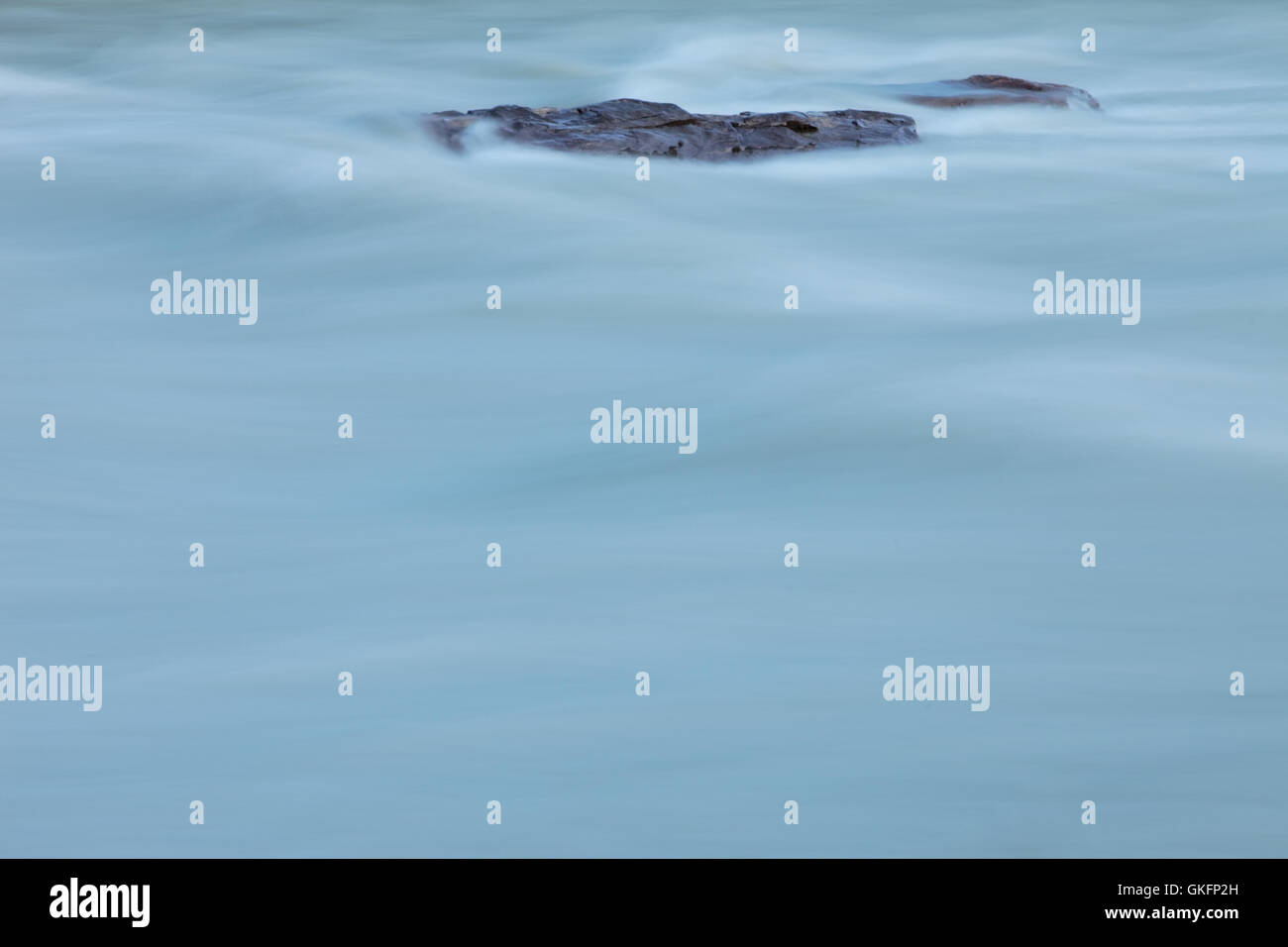 Flow of water with stones. Abstraction Stock Photo - Alamy