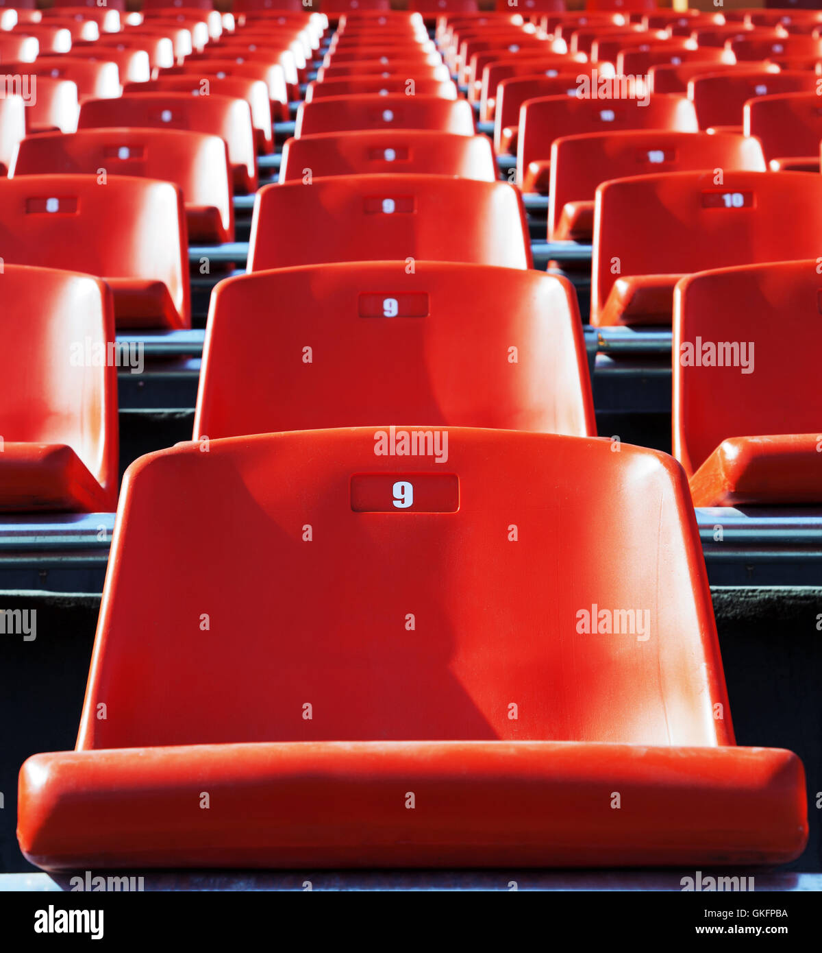 Red stadium seats Stock Photo - Alamy