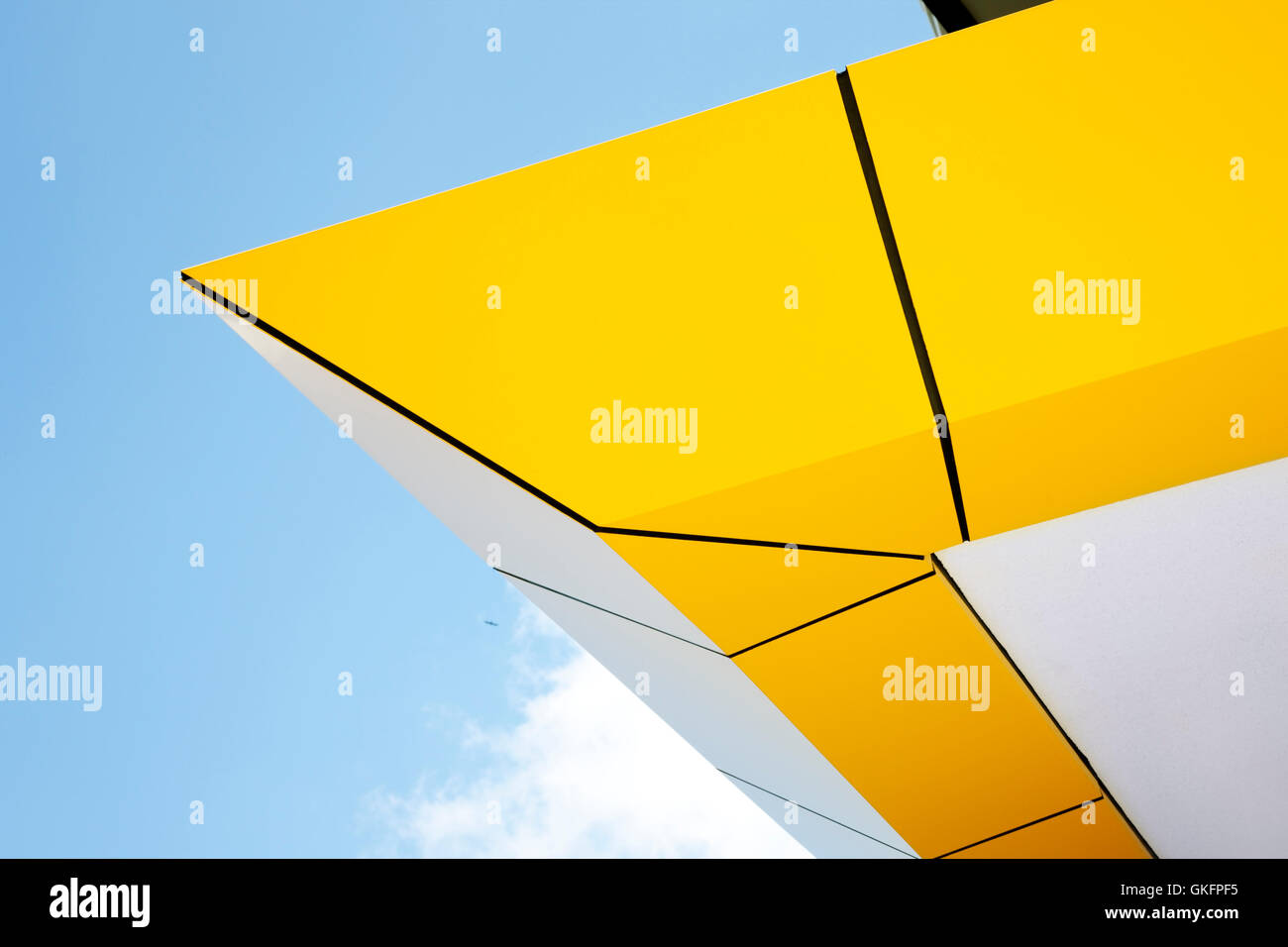 yellow peak building architecural feature Stock Photo - Alamy