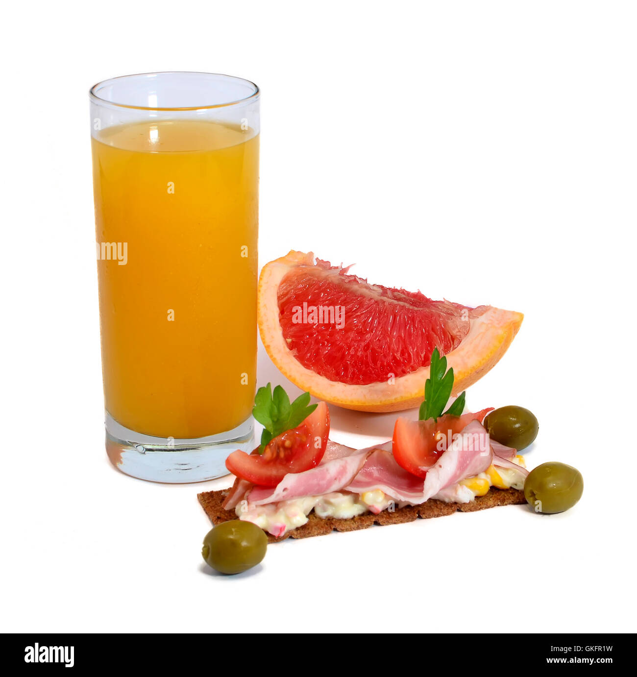 glass of orange juice, snack and grapefruit isolated on white Stock ...