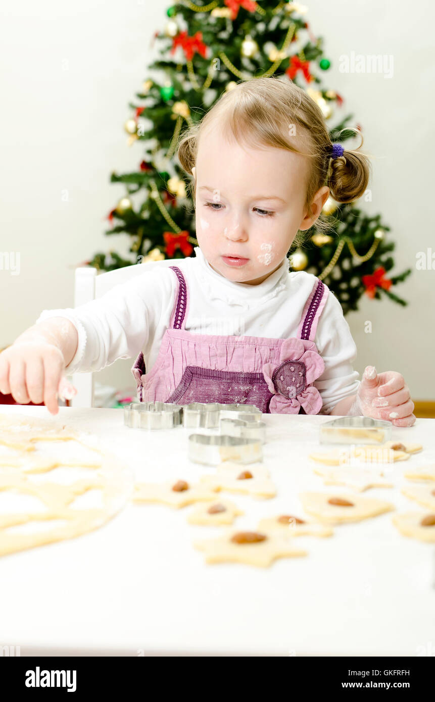 little cute girl making Christmas cookies Stock Photo - Alamy