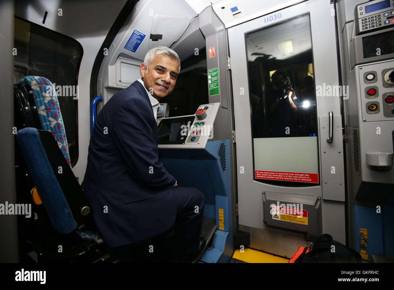 Sitting on tube train hi-res stock photography and images - Alamy