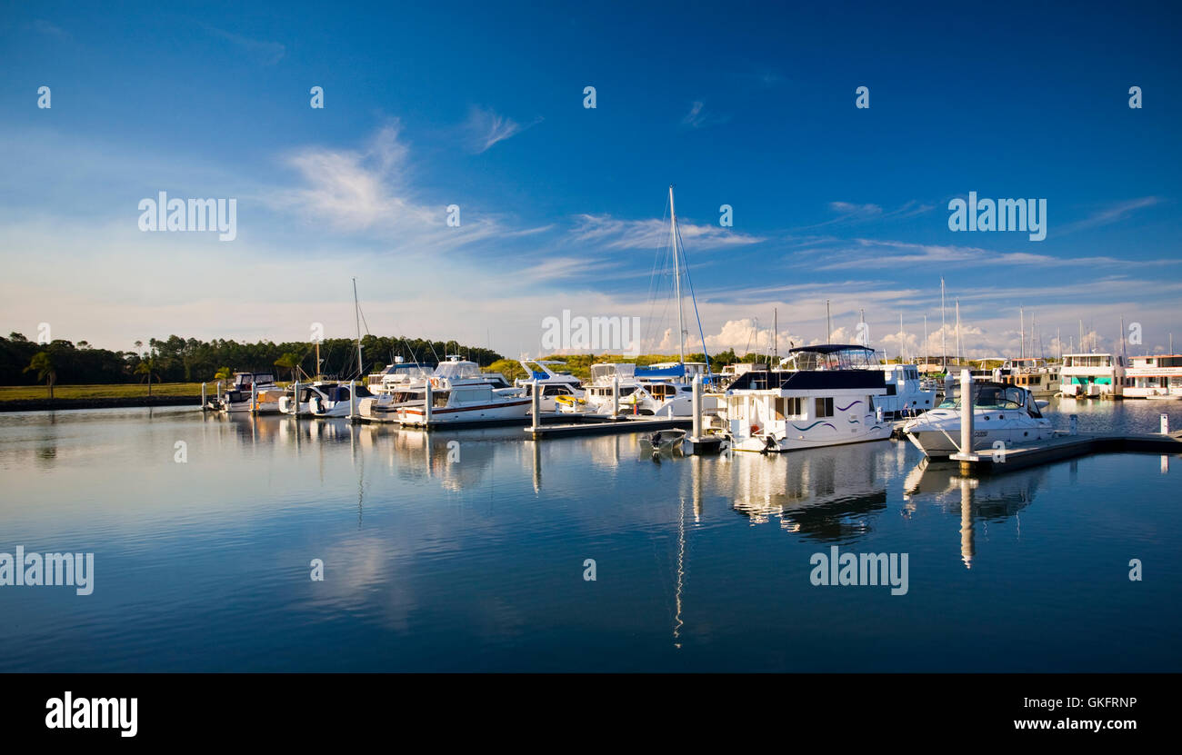 Boats with reflections at Hope Island Marina Stock Photo - Alamy