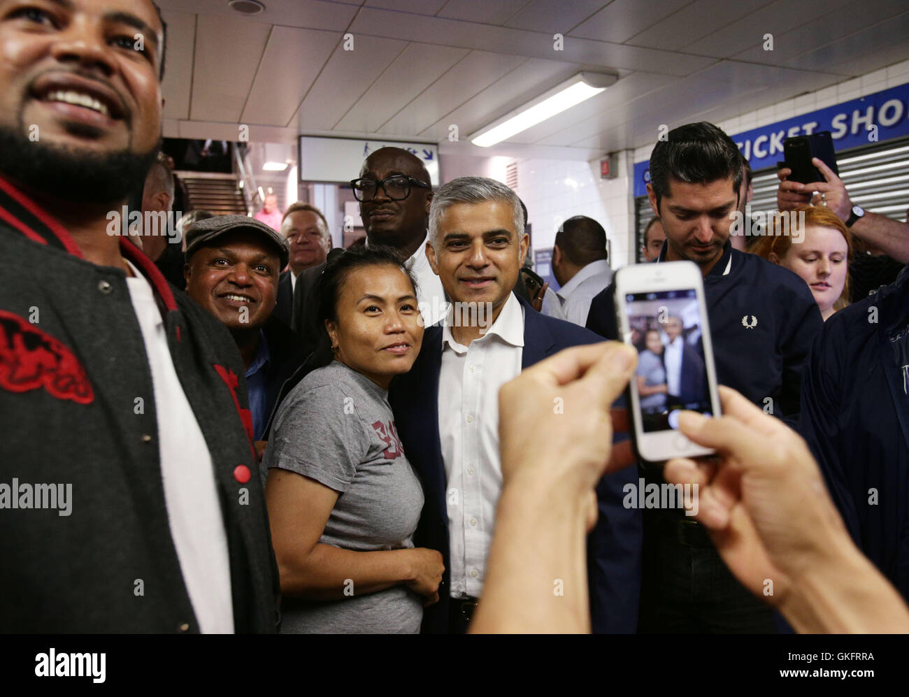 Mayor of London Sadiq Khan poses for photographs with members of the ...