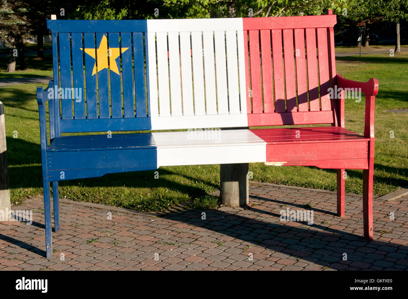 Acadian Flag Colors on Wood Bench - Edmundston - New Brunswick Stock ...