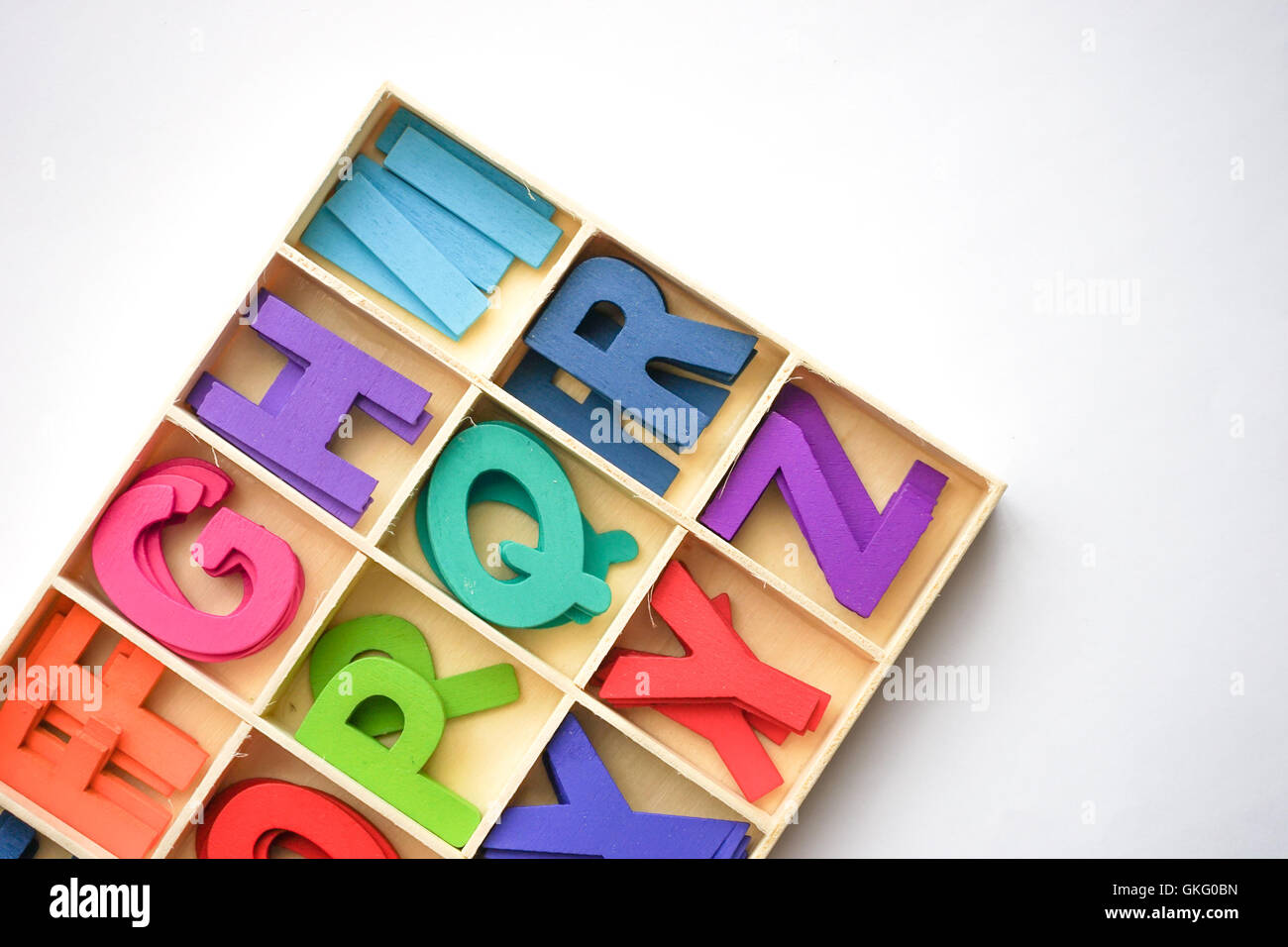 Colorful wooden letter with white background Stock Photo - Alamy