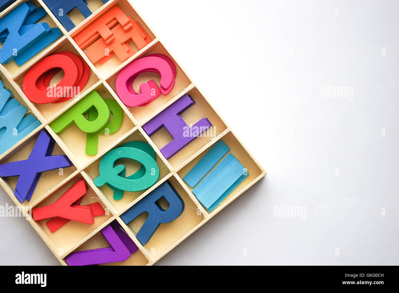 Colorful wooden letter with white background Stock Photo - Alamy