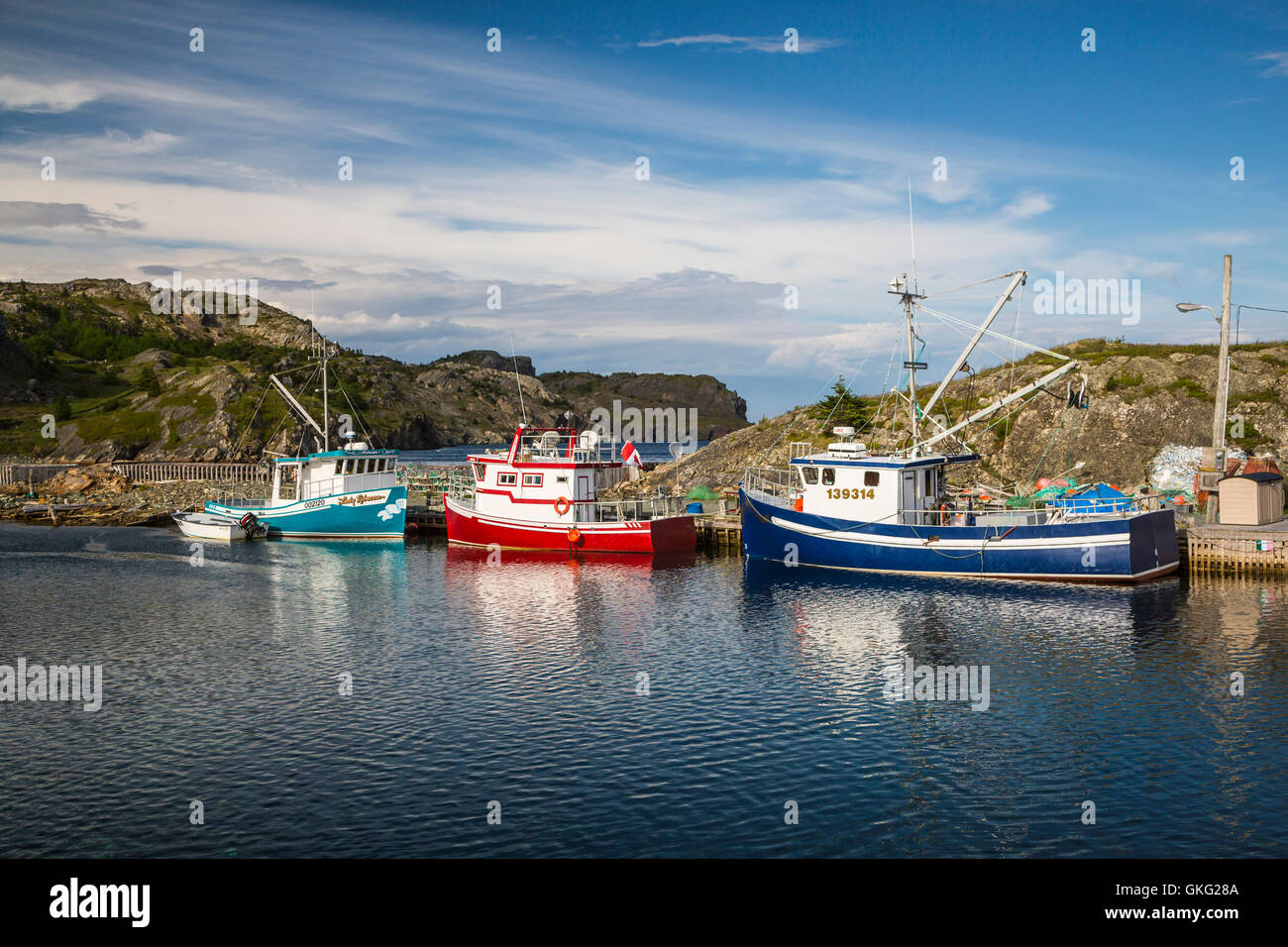 Colorful fishing boats in the picturesque harbor of Brigus ...