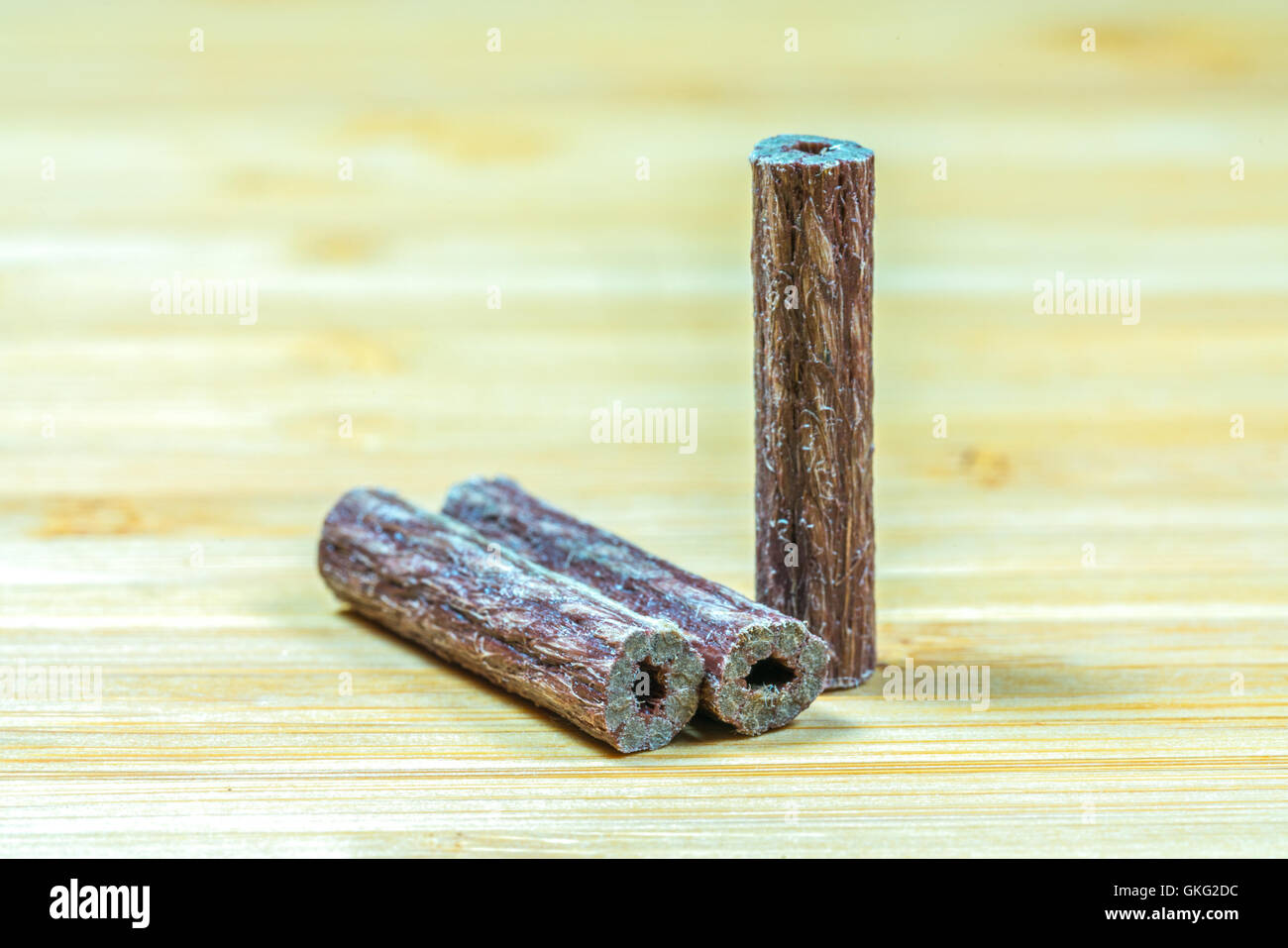 Wooden wall plug with bamboo texture surface Stock Photo - Alamy