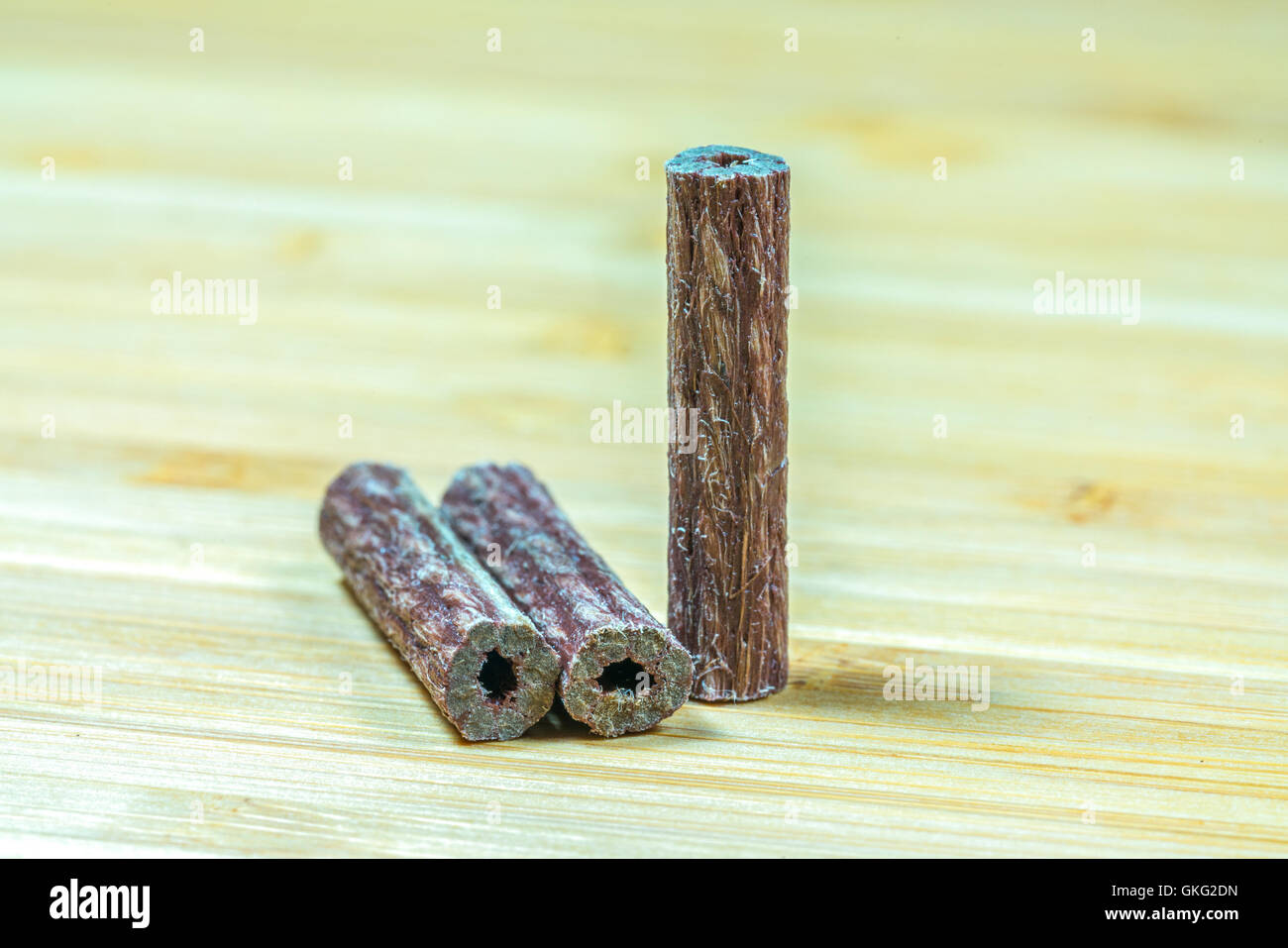 Wooden wall plug with bamboo texture surface Stock Photo - Alamy