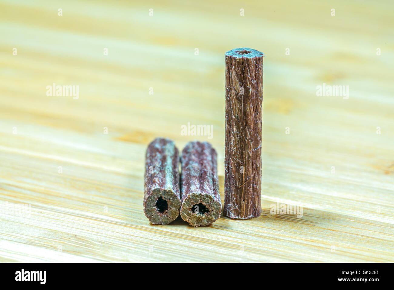 Wooden wall plug with bamboo texture surface Stock Photo - Alamy