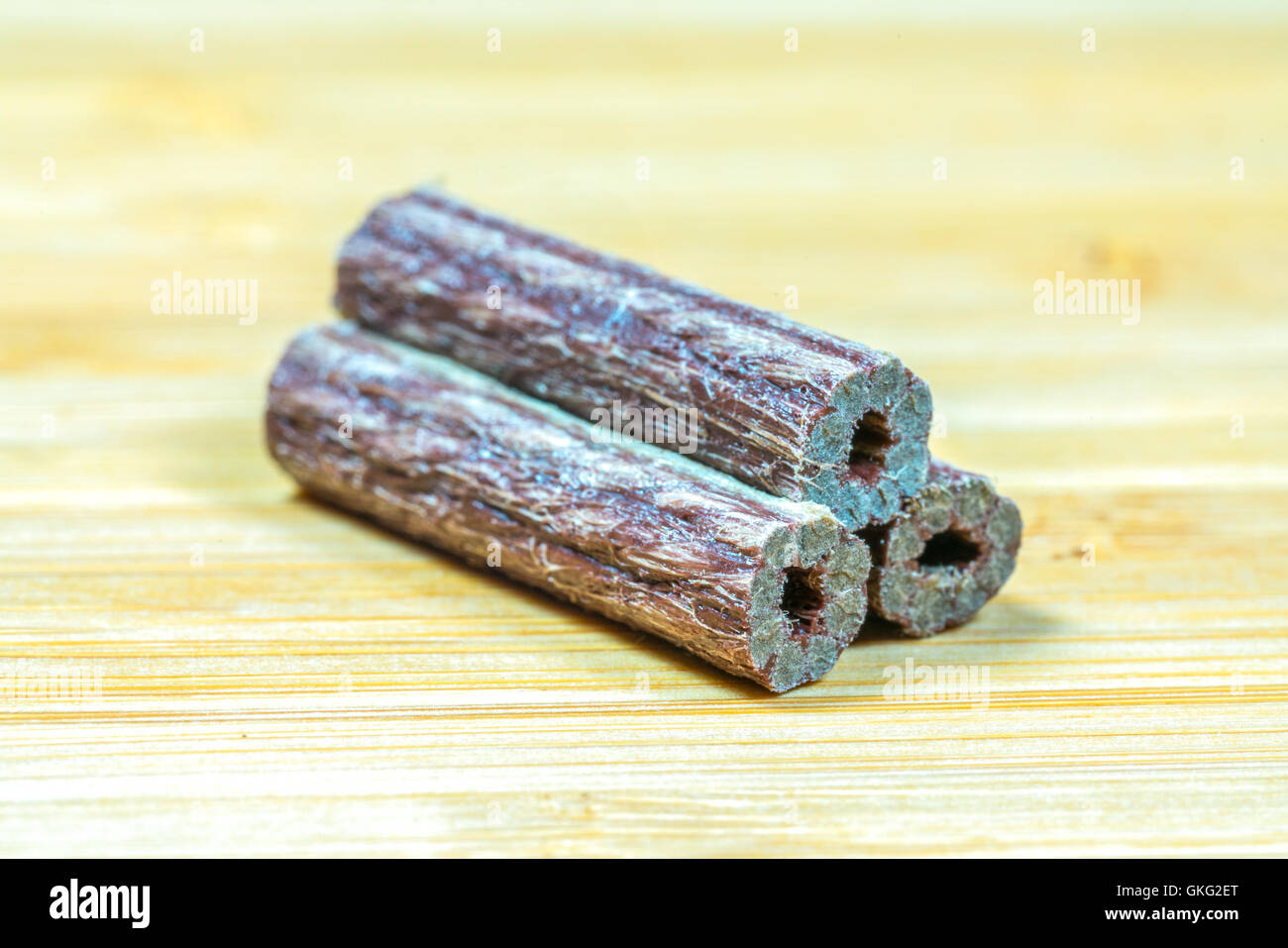 Wooden wall plug with bamboo texture surface Stock Photo - Alamy