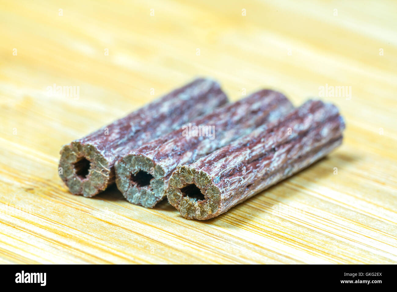 Wooden wall plug with bamboo texture surface Stock Photo - Alamy