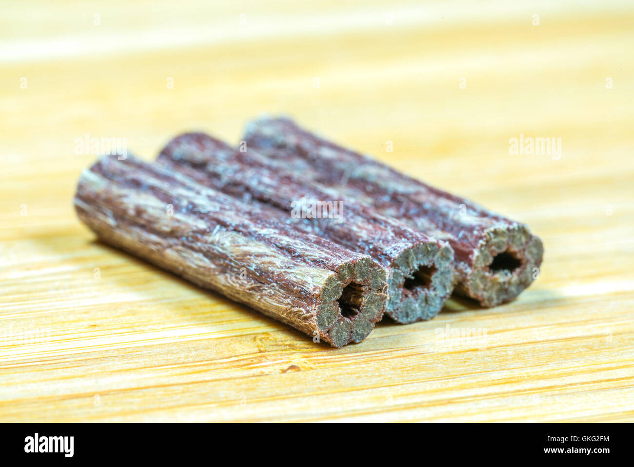 Wooden wall plug with bamboo texture surface Stock Photo - Alamy
