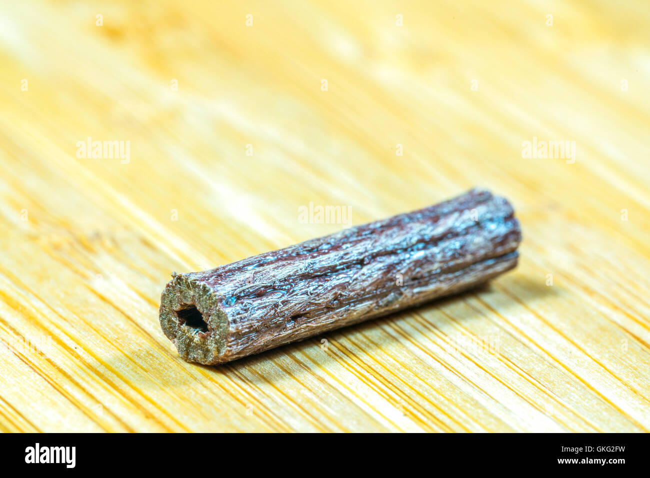 Wooden wall plug with bamboo texture surface Stock Photo - Alamy