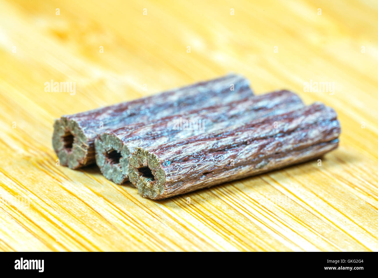 Wooden wall plug with bamboo texture surface Stock Photo - Alamy
