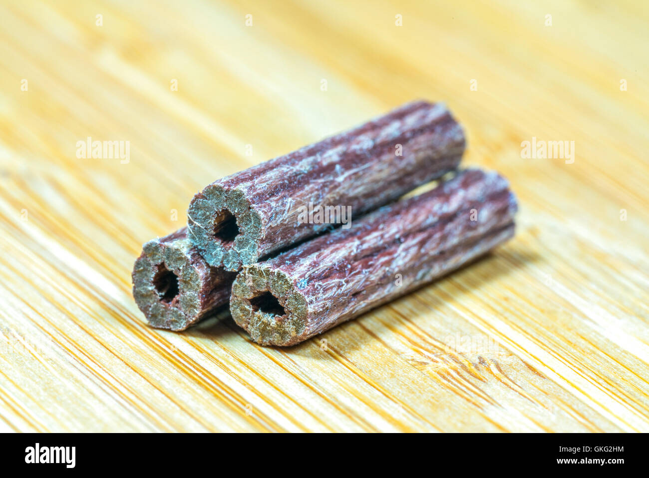 Wooden wall plug with bamboo texture surface Stock Photo - Alamy