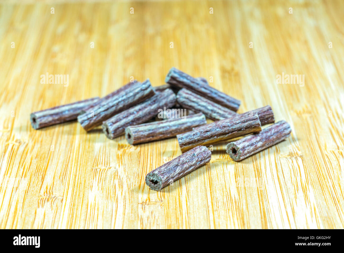 Wooden wall plug with bamboo texture surface Stock Photo - Alamy
