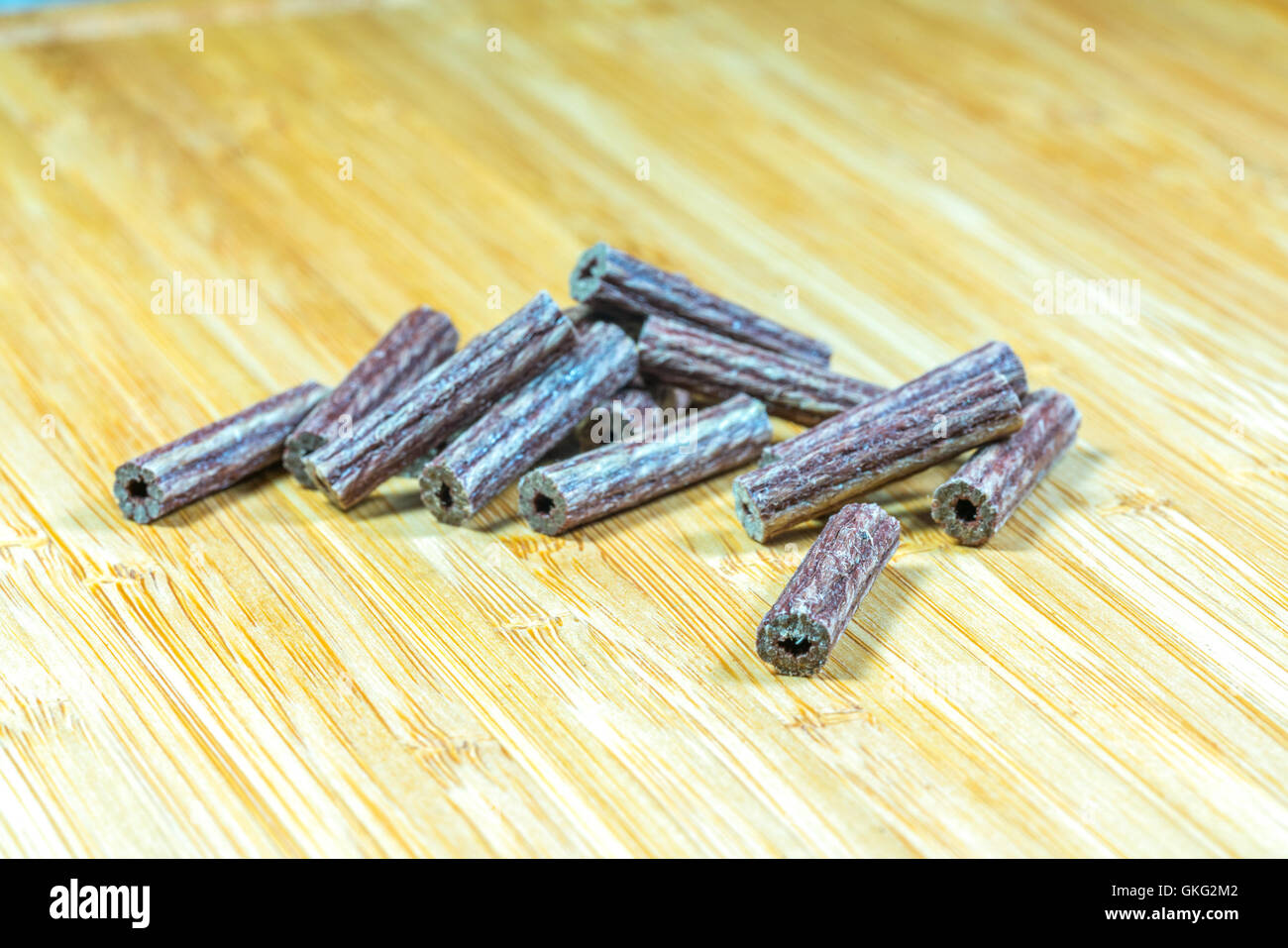 Wooden wall plug with bamboo texture surface Stock Photo - Alamy