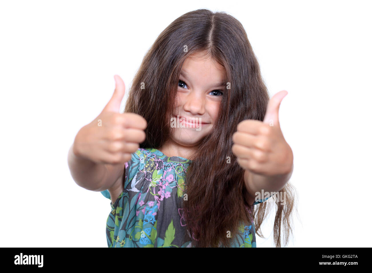 Beautiful little girl shows finger as sign that everything is fine ...