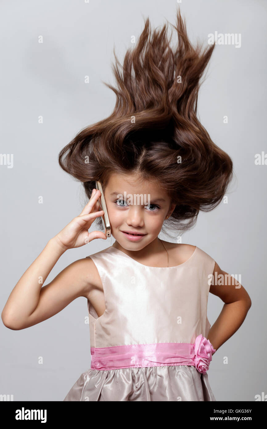 little girl calling by phone Stock Photo - Alamy