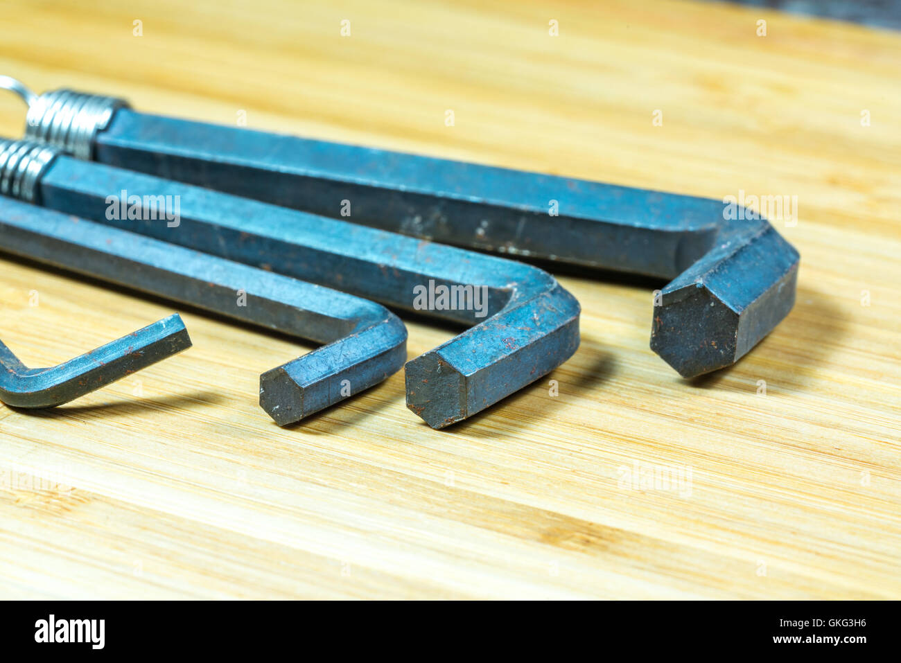 Set of L-Wrench over the bamboo texture background Stock Photo - Alamy