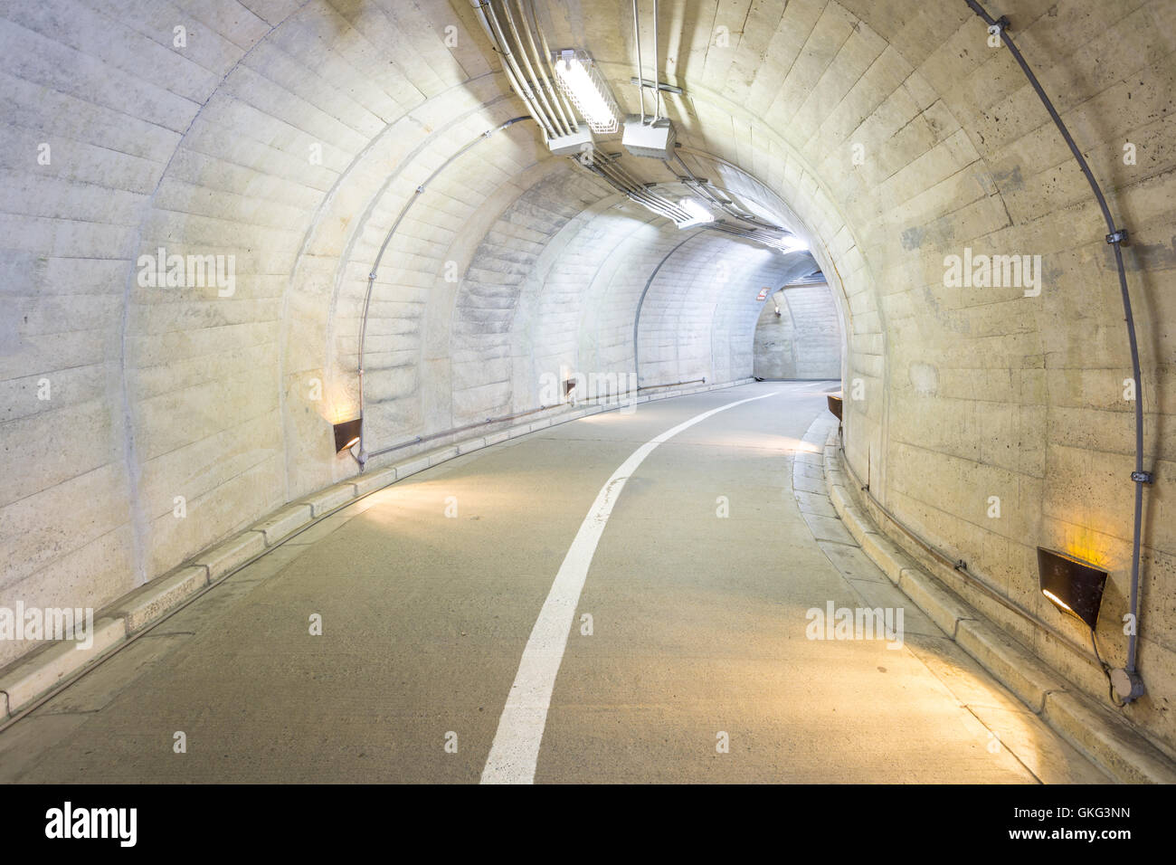 Interior of an urban walkway tunnel road Stock Photo - Alamy