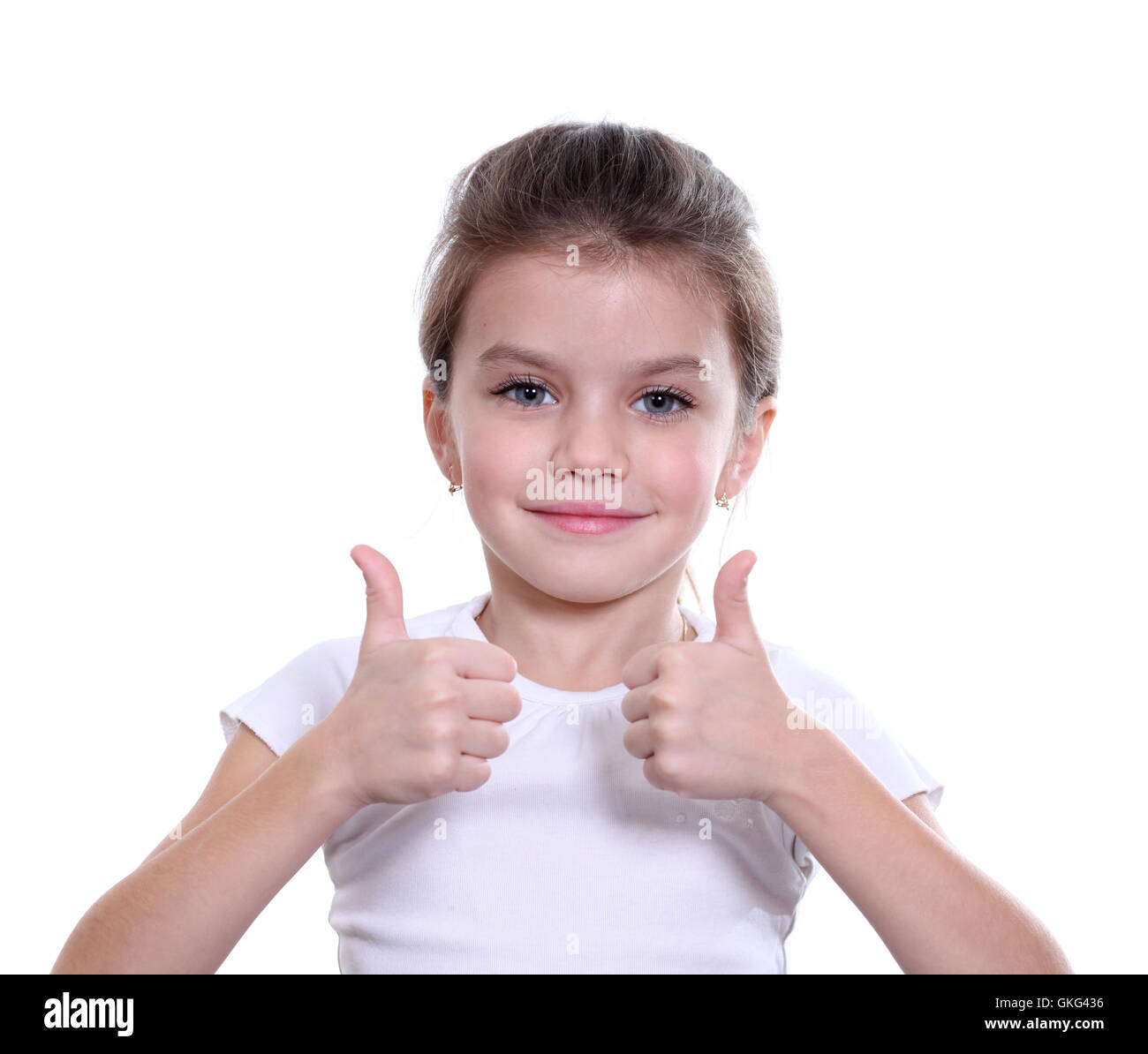Beautiful little girl shows finger as sign that everything is fine ...