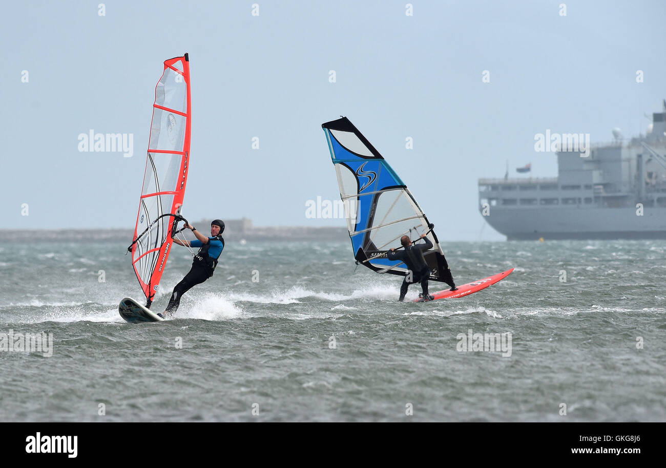Windsurfers in Portland harbour, Dorset, UK Stock Photo - Alamy