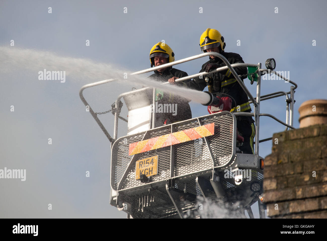 Firefighters on platform hi-res stock photography and images - Alamy