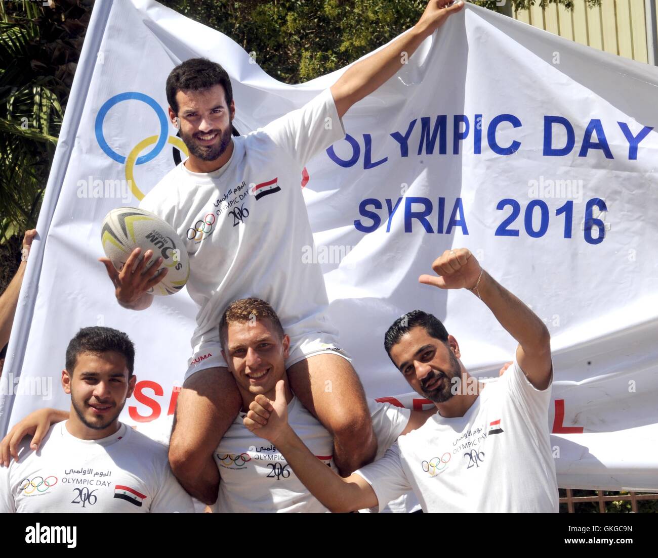 Damascus, Syria. 20th Aug, 2016. A group of Syrian athletes celebrate ...