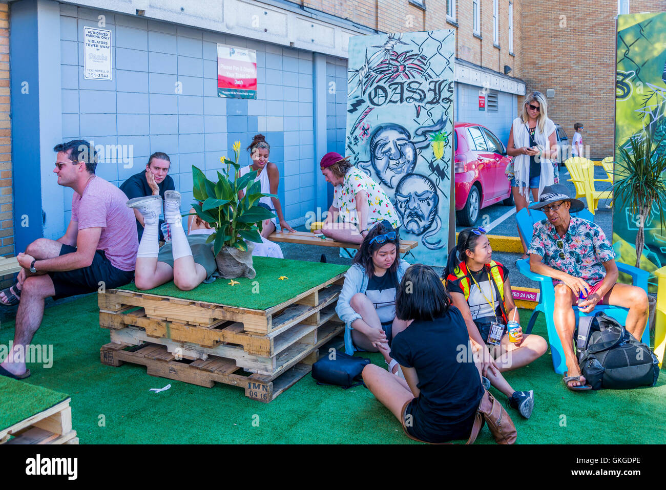 people hanging around Stock Photo - Alamy