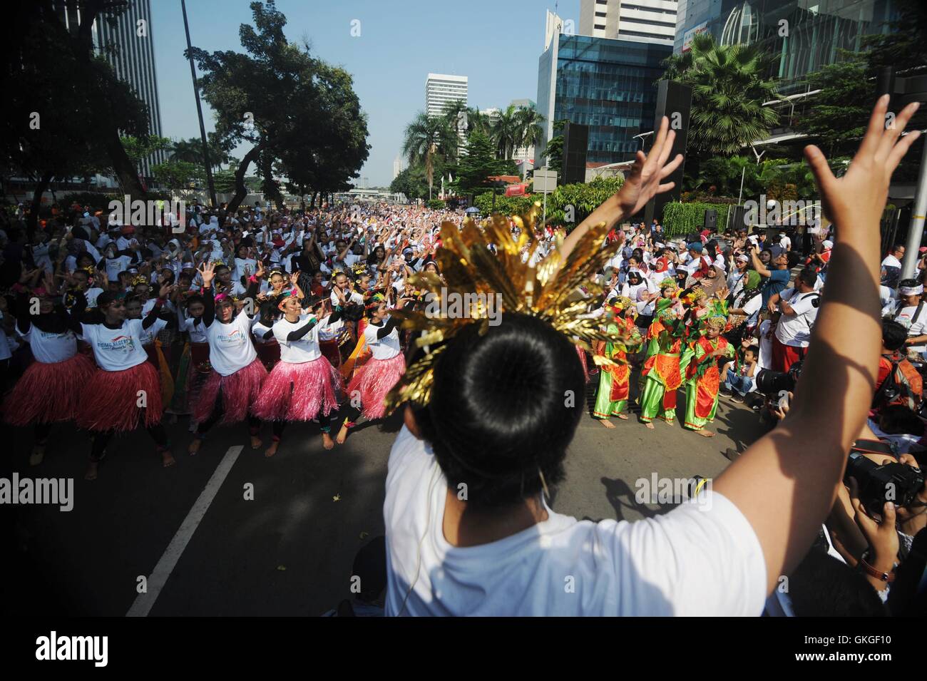 Jakarta, Indonesia. 21st Aug, 2016. People participate in a mass ...