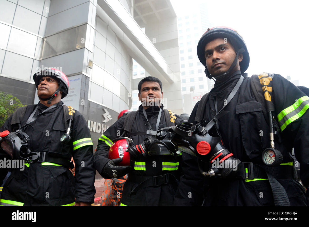 Bangladeshi firefighters work to douse a fire at the Bashundhara City ...