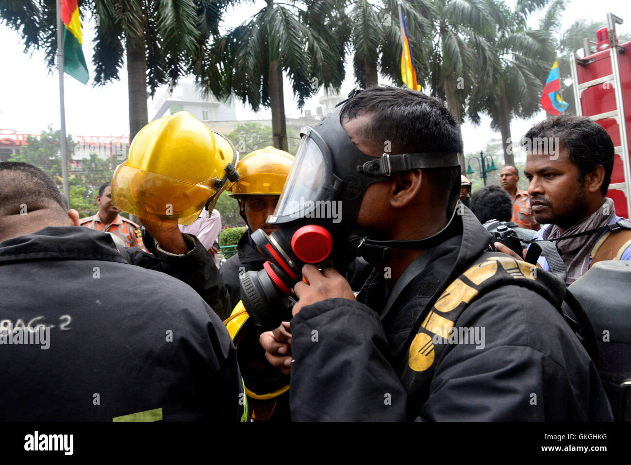 Bangladeshi firefighters work to douse a fire at the Bashundhara City ...