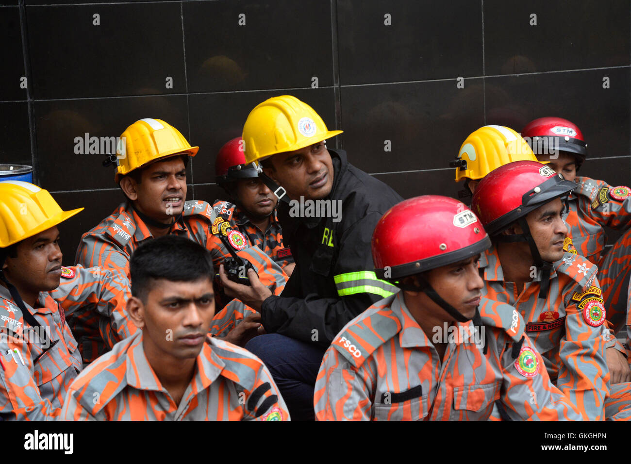 Bangladeshi firefighters work to douse a fire at the Bashundhara City ...