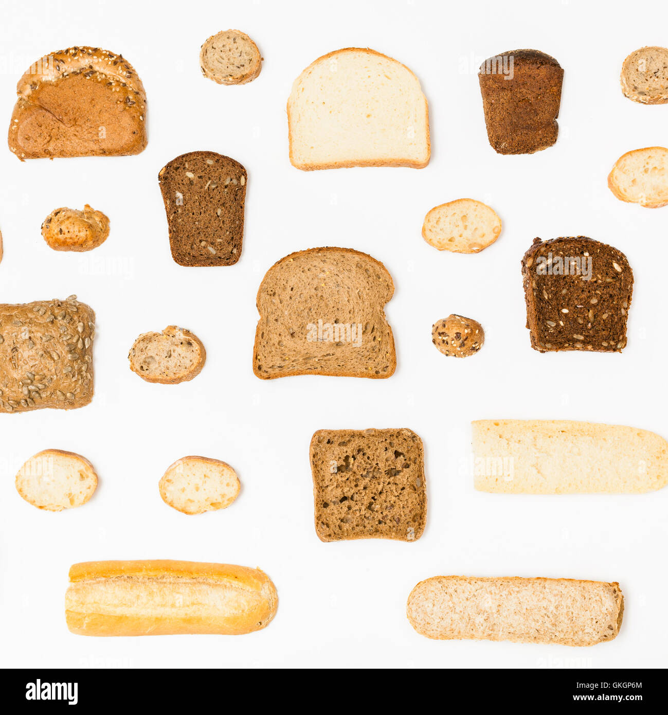 various sliced bread loaves on white background Stock Photo - Alamy