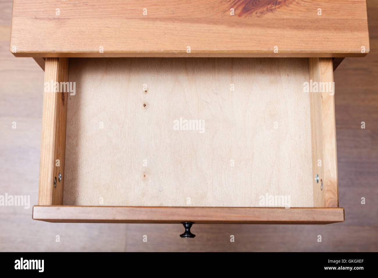 top view of empty open drawer of nightstand Stock Photo - Alamy