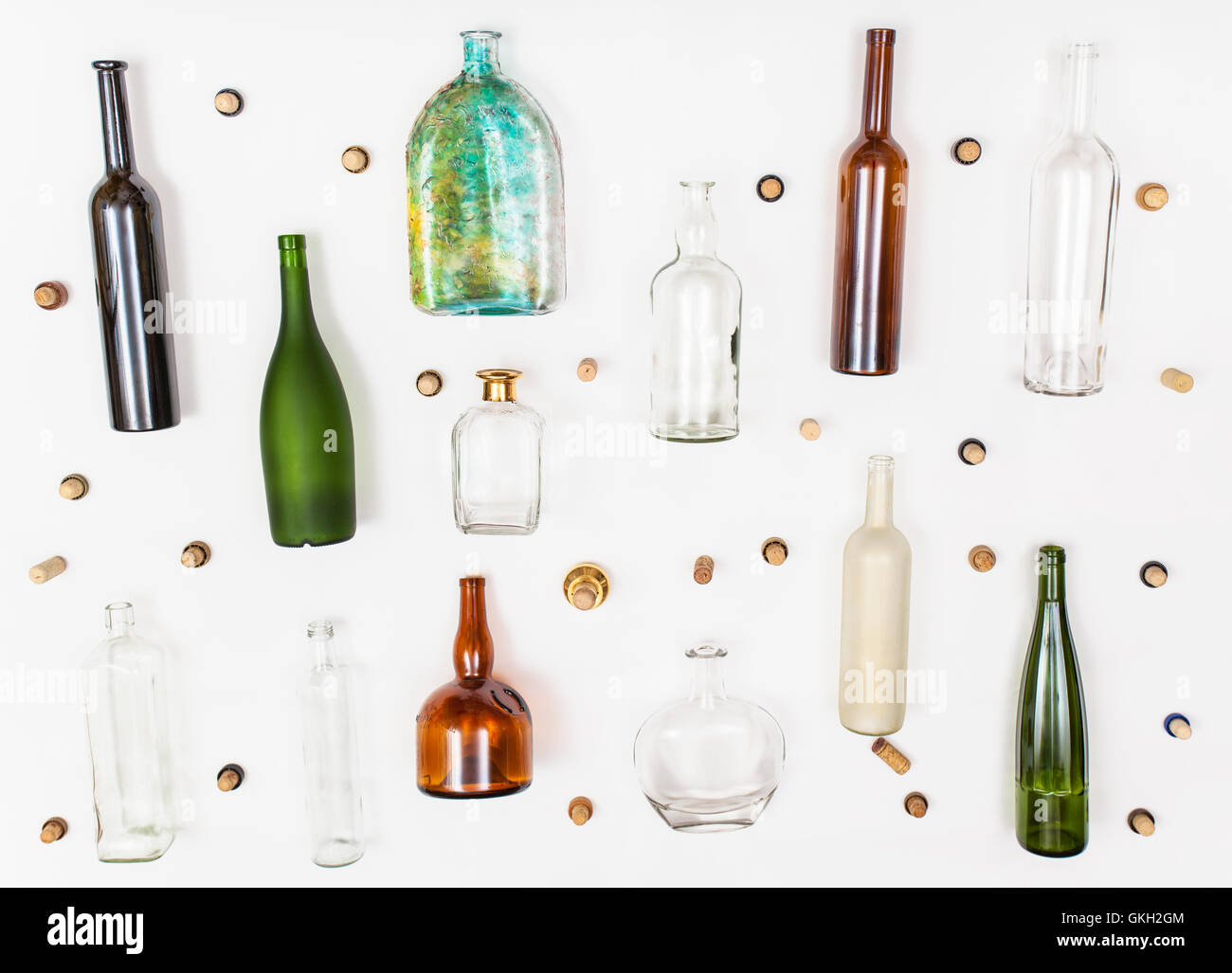 many empty glass bottles and corks on white background Stock Photo - Alamy