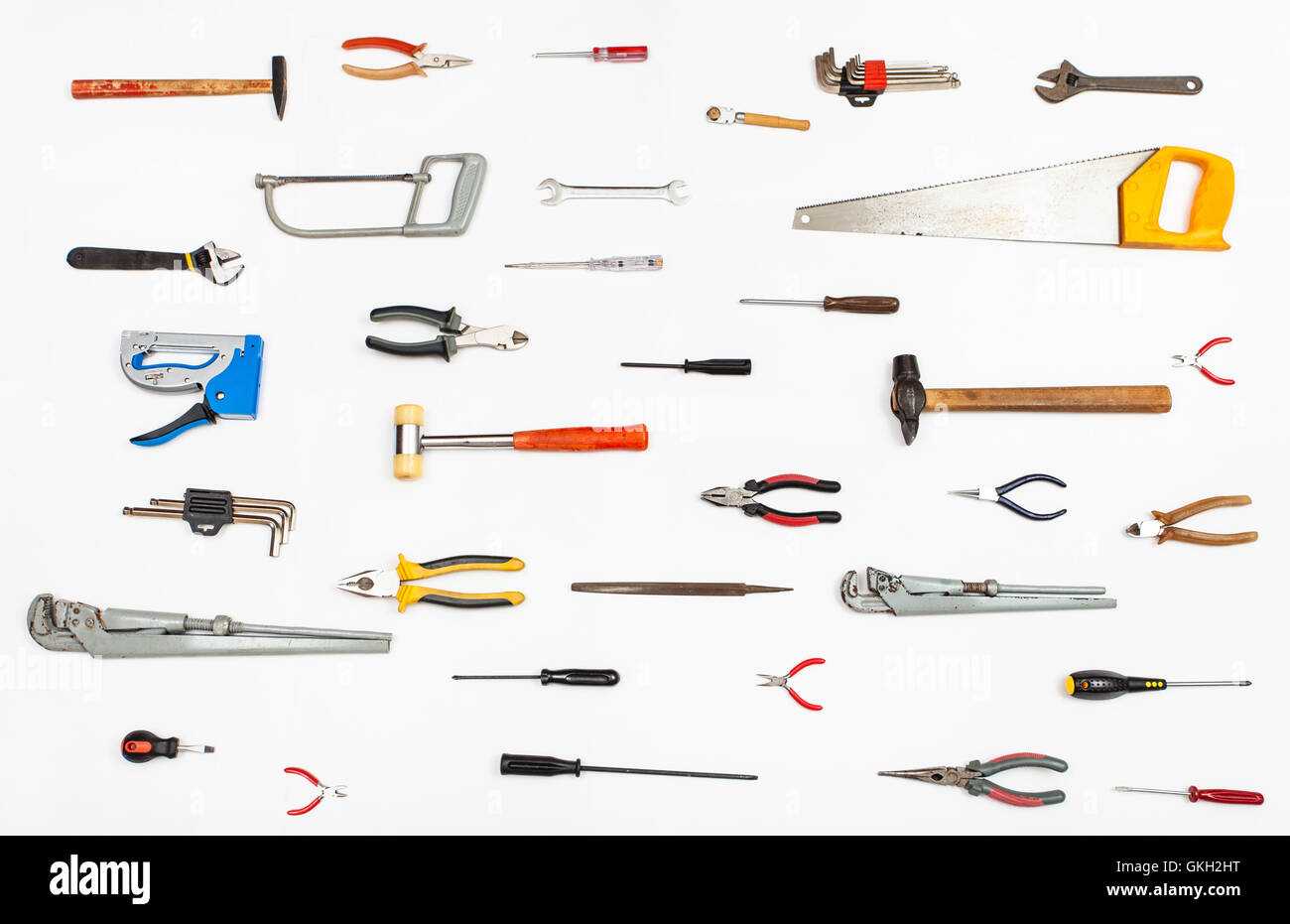 many hand tools arranged on white background Stock Photo - Alamy