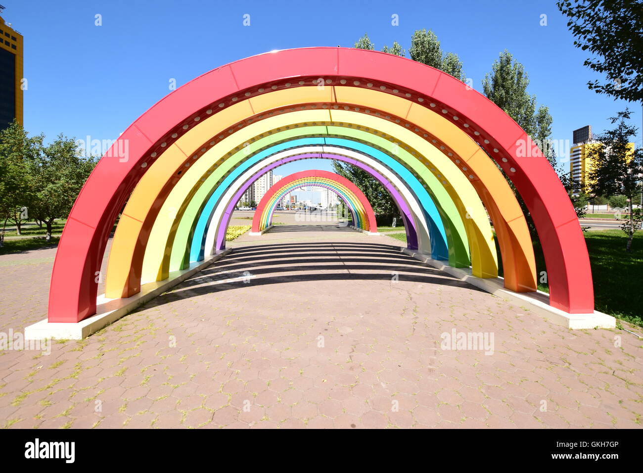 Street decoration in the form of colourful arches Stock Photo - Alamy