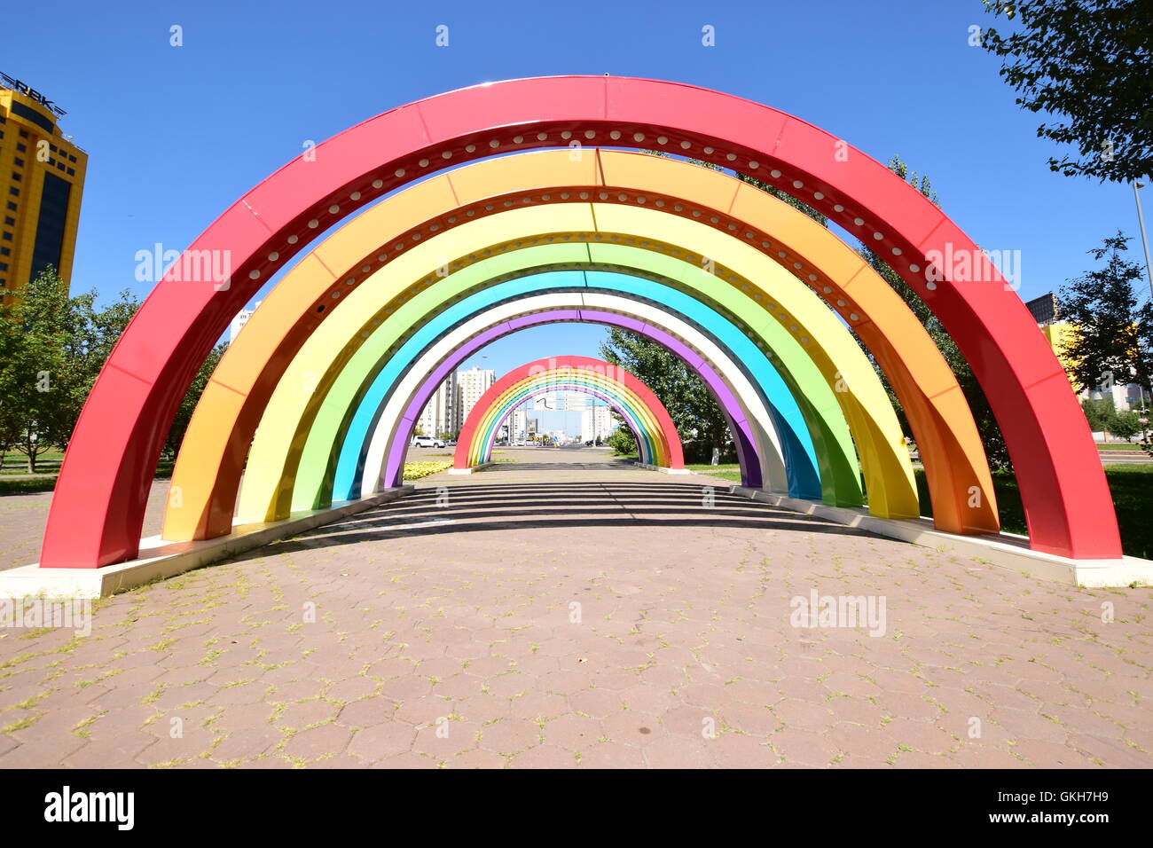 Street decoration in the form of colourful arches Stock Photo - Alamy