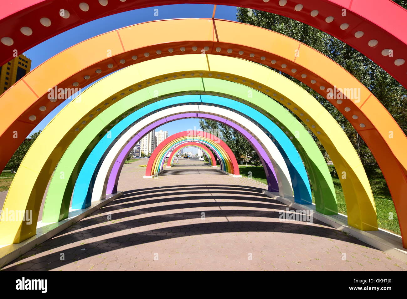 Street decoration in the form of colourful arches Stock Photo - Alamy