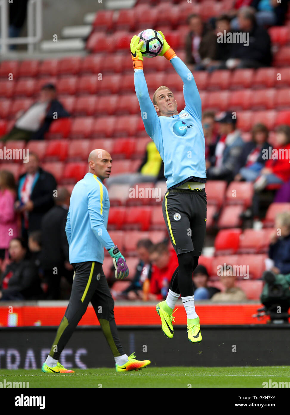 Manchester City's Joe Hart and Willy Caballero (right) warm up before ...