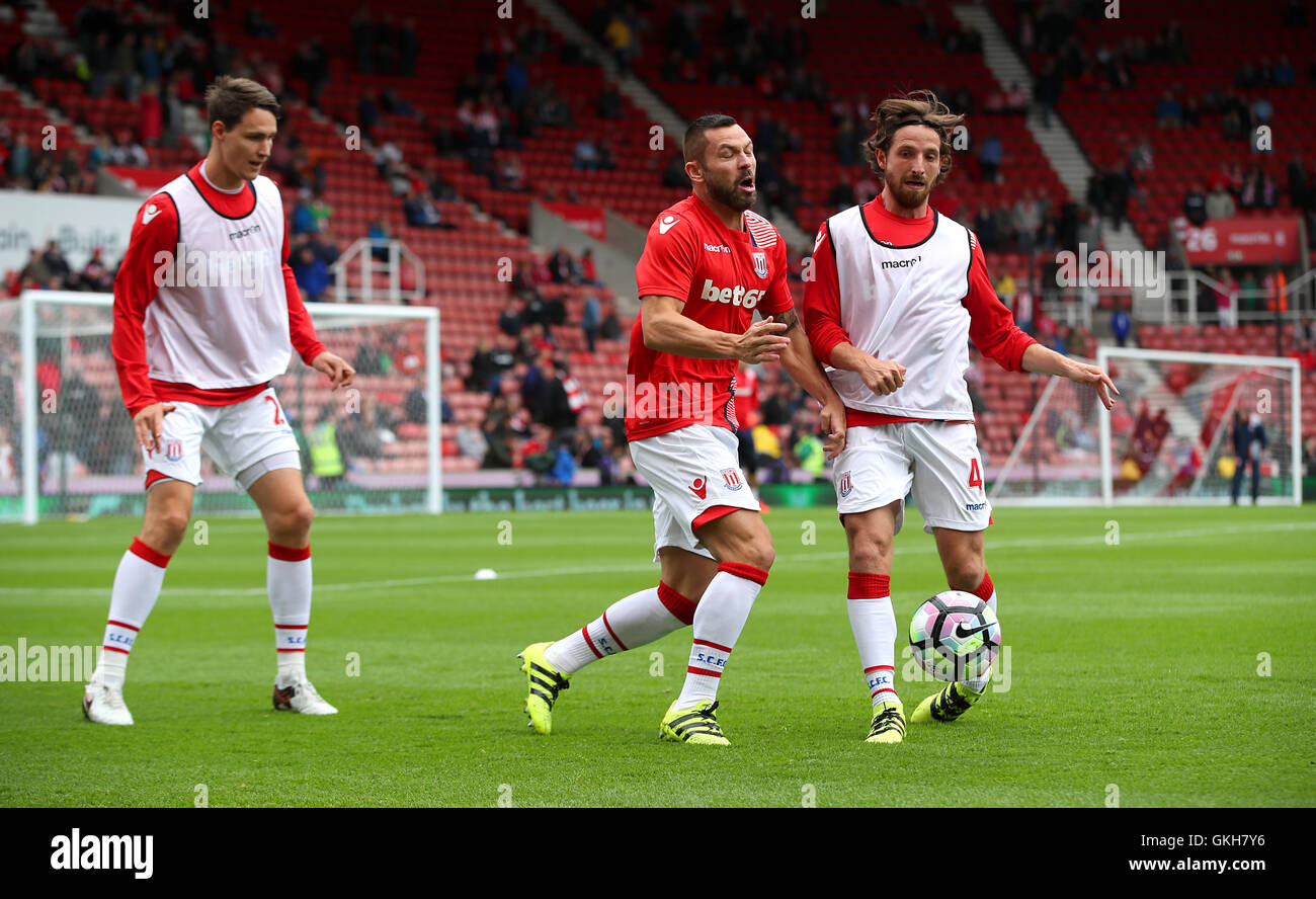 Stoke City's Phil Bardsley (centre) and Joe Allen (left) warm up before ...