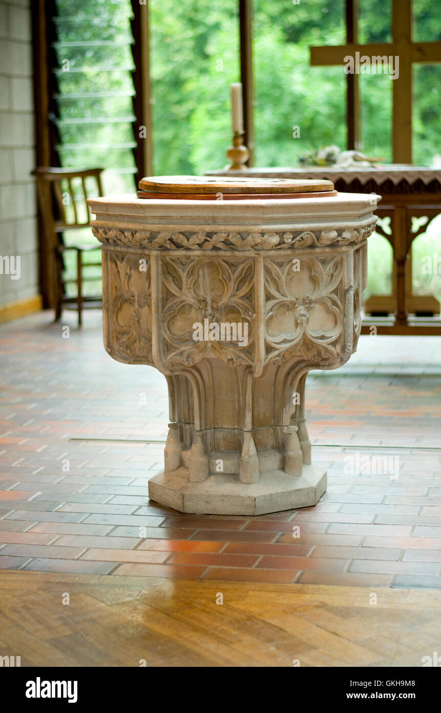 Stone font in a modern church Stock Photo - Alamy