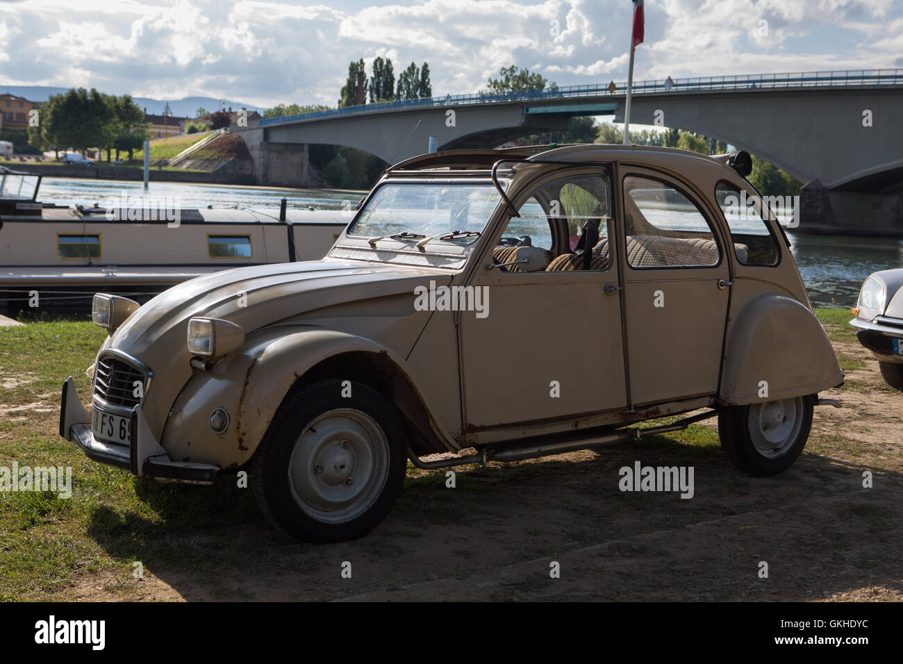 Vintage French car Citroen 2CV sitting alongside river Saone in France ...