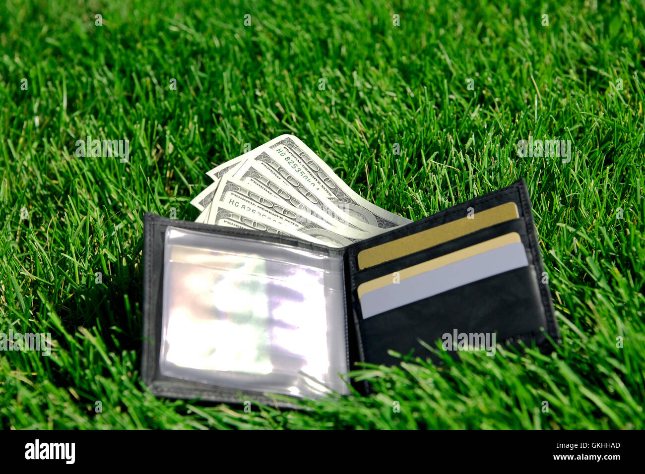 Overflowing purse hi-res stock photography and images - Alamy