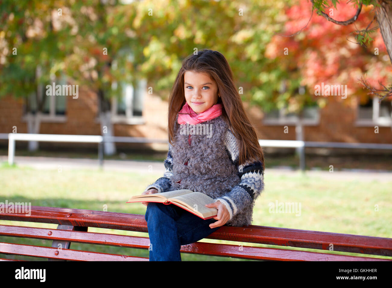 Girl Sitting Down On Bench