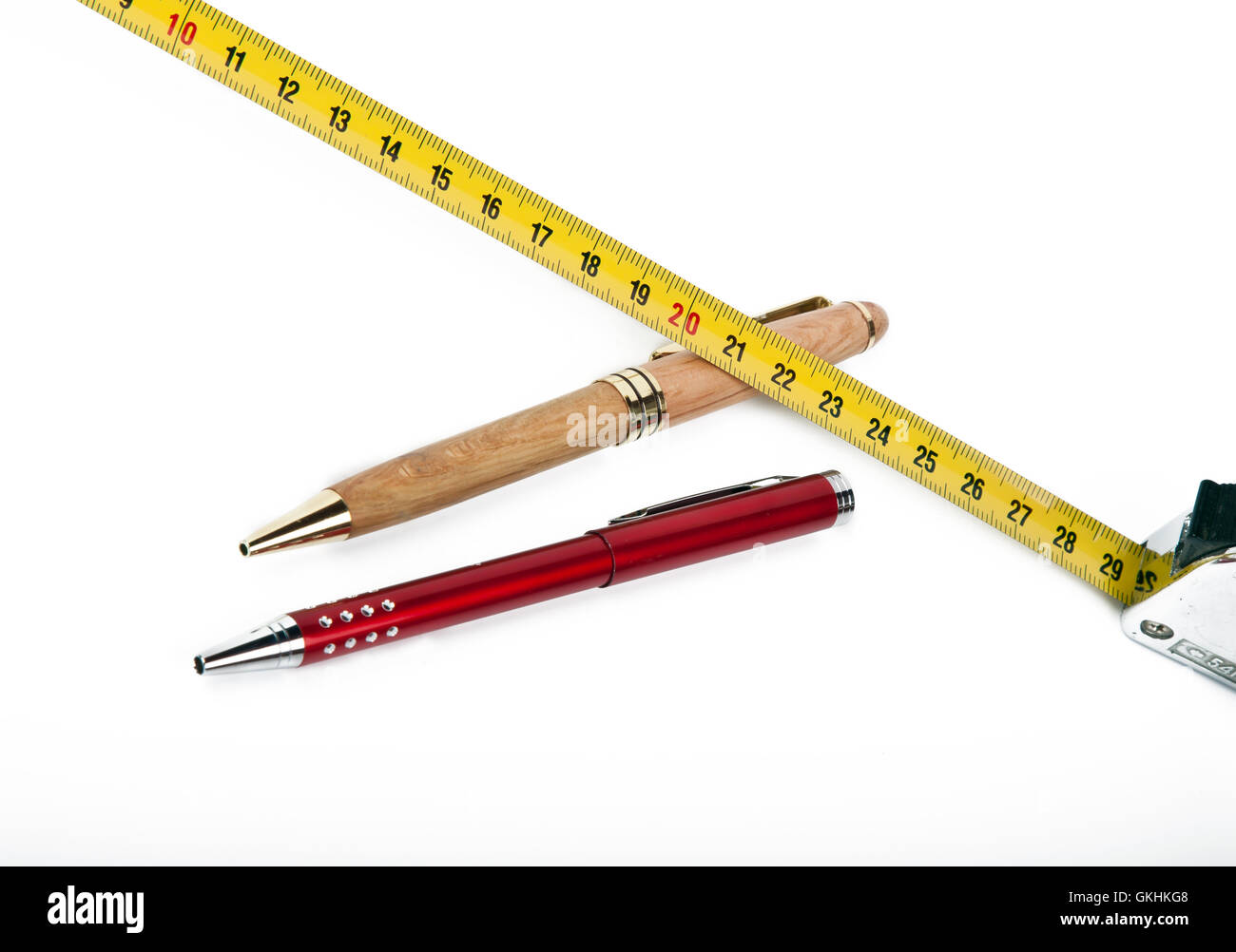 ballpoint pens and measuring tape Stock Photo - Alamy